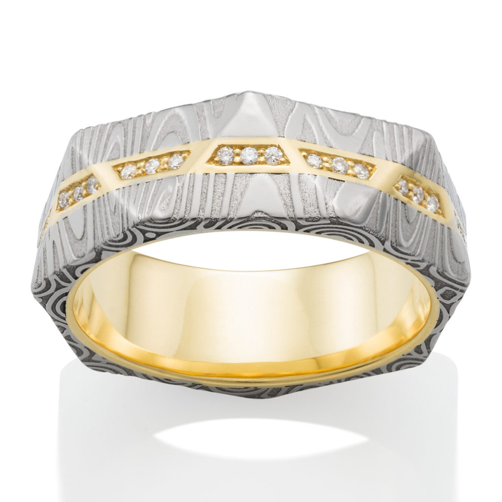 Precious Damascus Rings and Wedding Bands | Damascus Steel Rings laid ...